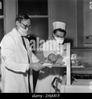 A premature baby in one of the machines that can save new born babies ...