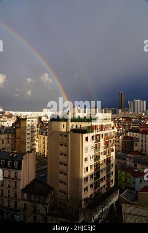 Double rainbow over Paris roofs Stock Photo - Alamy