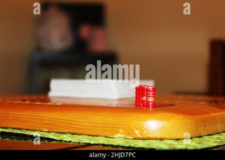 Playing cards in wooden table black and white enjoy your game Stock ...