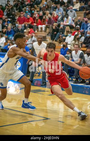 Jack McCloskey #10 of Mater Dei shoots the basket as Kyle Evans #32 of ...