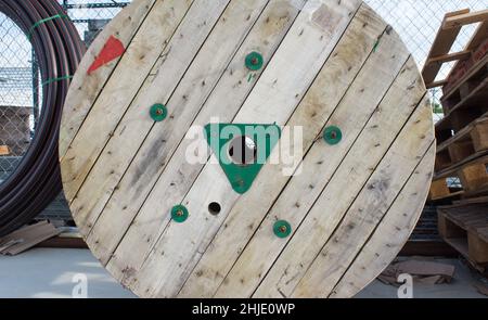 Big wooden cable roll , process in vintage style Stock Photo - Alamy