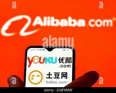 In this photo illustration, the Youku logo is displayed on a smartphone ...