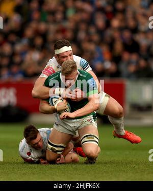 Tom Pearson of London Irish is tackled by Andrea Cocagi during the ...