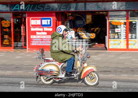 British Mod riding a motor scooter embellished with mirrors Stock Photo ...