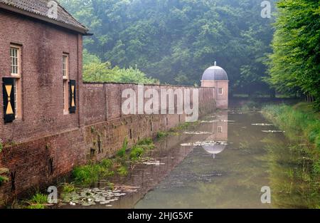 Brick wall along a castle moat near Ommen Stock Photo - Alamy