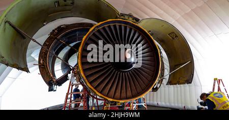 Boeing 747-8 inboard engine with cowling open for maintenance. This is ...