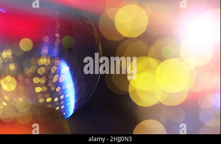 Crystal Ball on the floor with bokeh. Glass ball with colorful bokeh ...