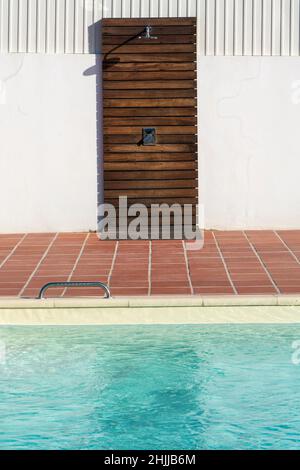 Showers at public swimming pool Stock Photo - Alamy
