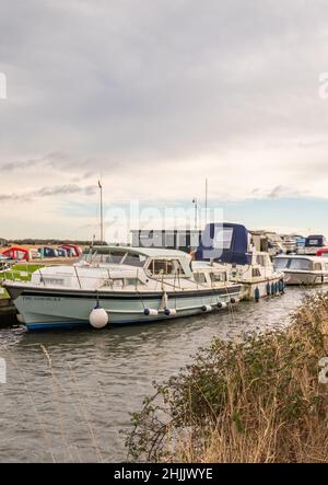Acle, Norfolk, UK – January 2022. Metal sluice gate on the River Bure ...