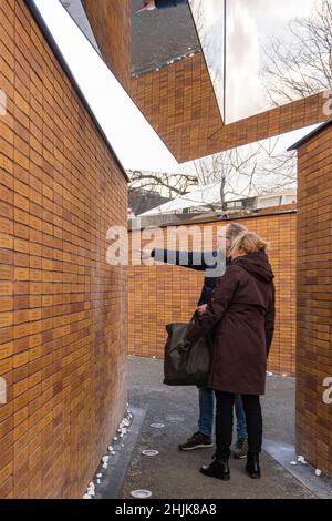 AMSTERDAM - Visitors in the National Holocaust Museum. The museum ...