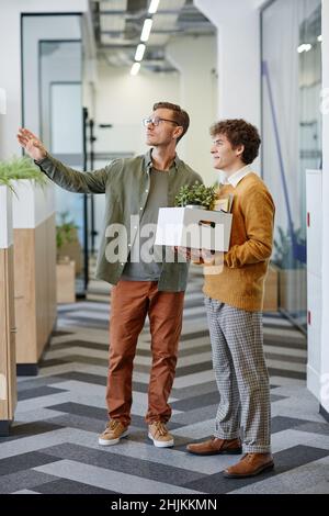 Manager welcoming a new employee at office; panoramic banner Stock ...