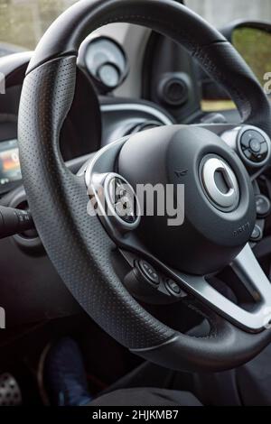 Unidentifiable human driving a car Stock Photo - Alamy