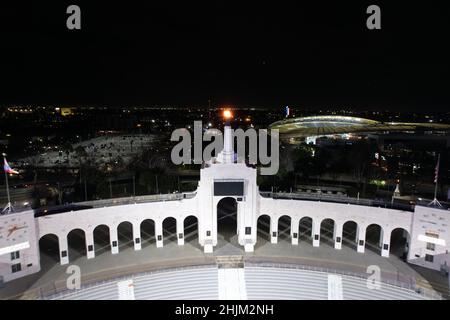 The Los Angeles Memorial Coliseum peristyle and the Olympic torch ...