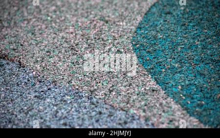 Two colored rubber floor for a play ground Stock Photo - Alamy