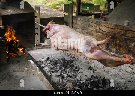 Spit Roasting A Whole Lamb Stock Photo - Alamy