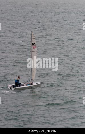 Man sailing a RS Vareo single handed sailing dinghy on the Solent ...
