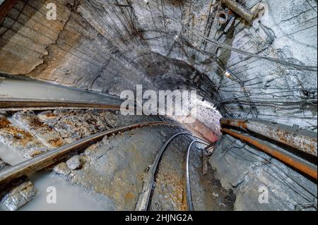 Underground mine railway for transporting ore. Freight trolleys and ...