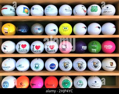 Multi-colored golf balls on green grass. Golf Club. Sports and ...