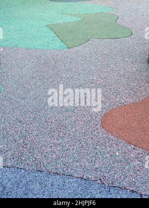 Two colored rubber floor for a play ground Stock Photo - Alamy