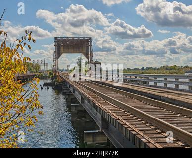 An old bascule railroad bridge,also known as a drawbridge or a lifting ...