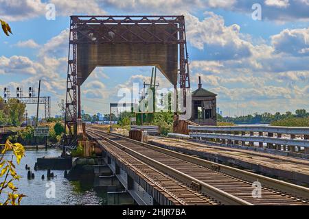 An old bascule railroad bridge,also known as a drawbridge or a lifting ...