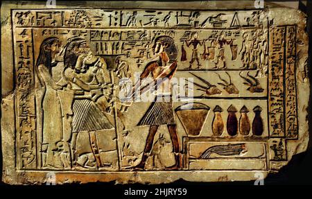 Ancient Egyptian stele showing Iti & Neferu receiving food offerings ...