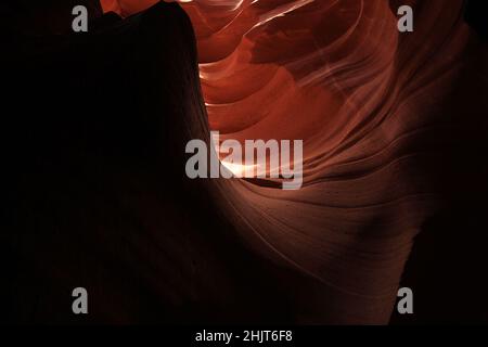 The contrast between the shadows and the lights inside the narrow red ...