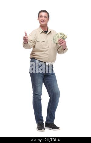 Smiling businessman in jeans with dollar money showing thumbs up Stock ...