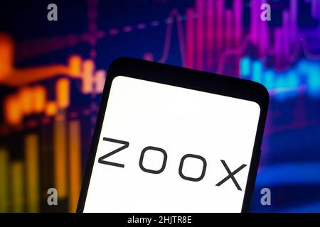 In this photo illustration the Zoox logo seen displayed on a smartphone ...