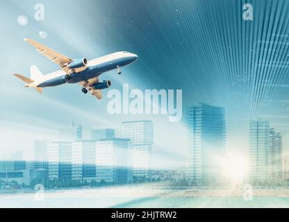 Airplane hovering highly in the sky over skyscrapers Stock Photo - Alamy