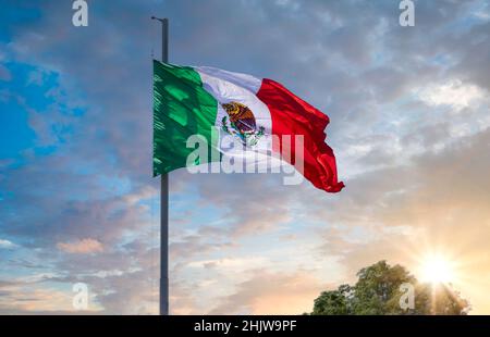 Los Cabos, Mexico, Mexican tricolor national striped flag proudly ...