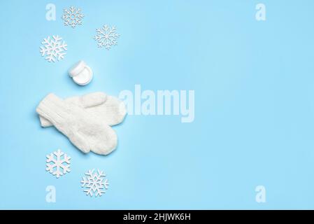 Jar with cream and snowflakes on color background Stock Photo - Alamy