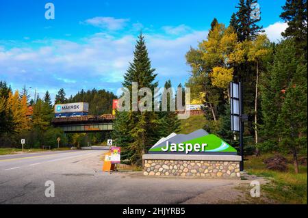 Welcome sign to the village of Jasper located within the Canadian ...