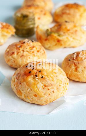 Homemade cheese rolls on baking sheet. Close-up photo Stock Photo - Alamy