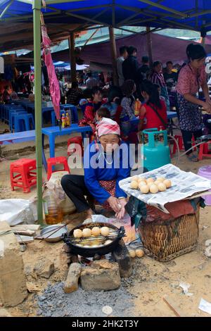 Vietnam. Open market where cows are bartered and food is sold. Sapa ...