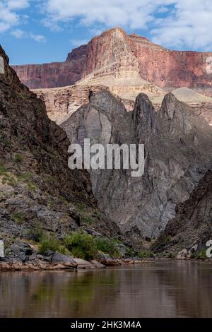 USA, Arizona. Floating down the Colorado River surrounded by canyon ...