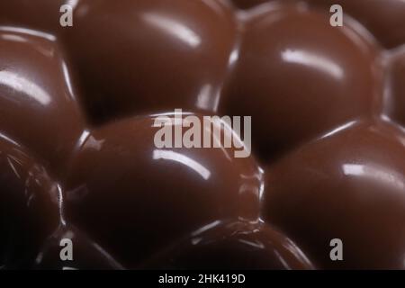 Closeup of bar of airy aerated milk chocolate background Stock Photo ...