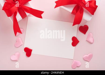 Pink gift boxes with red ribbon on white background. Valentine's Day ...