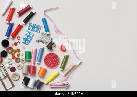 Sewing accessories of buttons, threads and needles. Needlework set ...