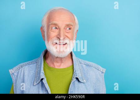 Photo of pretty thoughtful man pensioner dressed denim vest hand arm ...