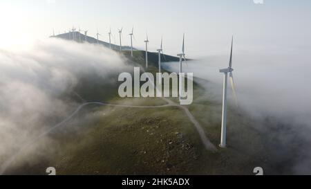 eolic generators on the top of a cloudy mountain Stock Photo - Alamy