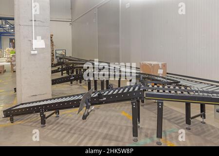 Automated Long Conveyor Sorting Rollers in Distribution Warehouse Stock ...