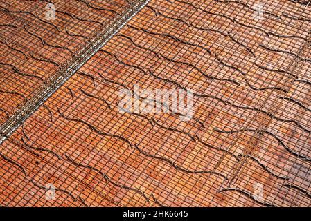 Wood frame and reinforcing steel rods or rebar used in preparation for ...
