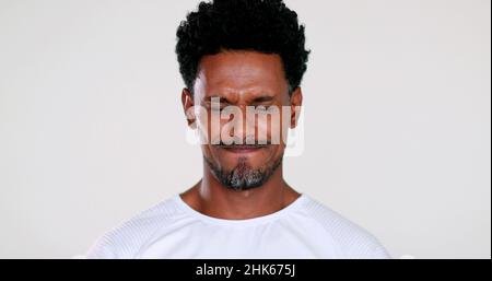 African man agreeing nodding yes portrait face, accepting circumstance ...