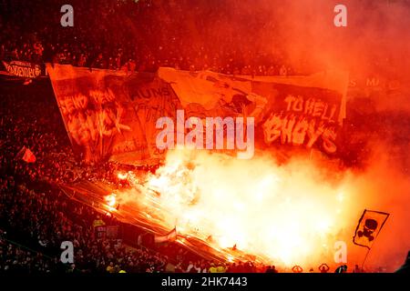 Celtic fans light flares in the stands during the cinch Premiership ...
