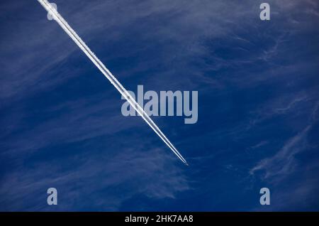 Cloudy sky with contrails, cirrus clouds or feather clouds, Austria ...