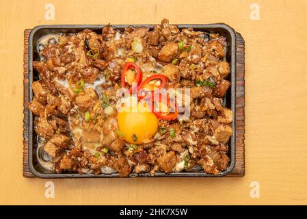 Sisig is a Filipino food of Pampanga origin. It is made with pig's head ...