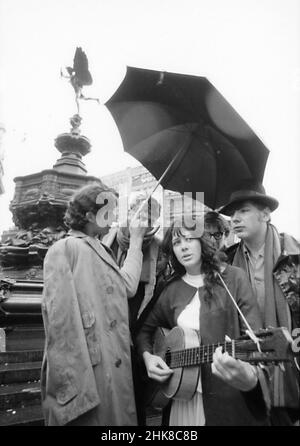 Vashti Bunyan playing guitar and singing at Piccadilly Circus, 1966 ...