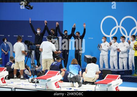 Manuel Frigo, Thomas Ceccon of Italy celebrate after winning the silver ...