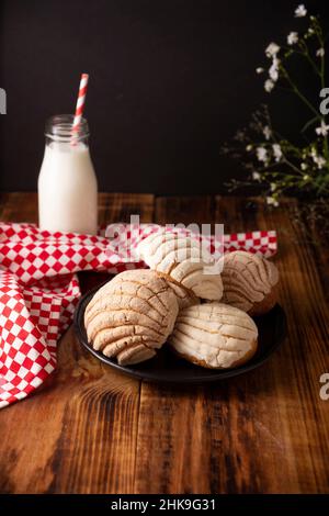 Concha and chocolate, mexican sweet bread and atole beverage in mexico ...